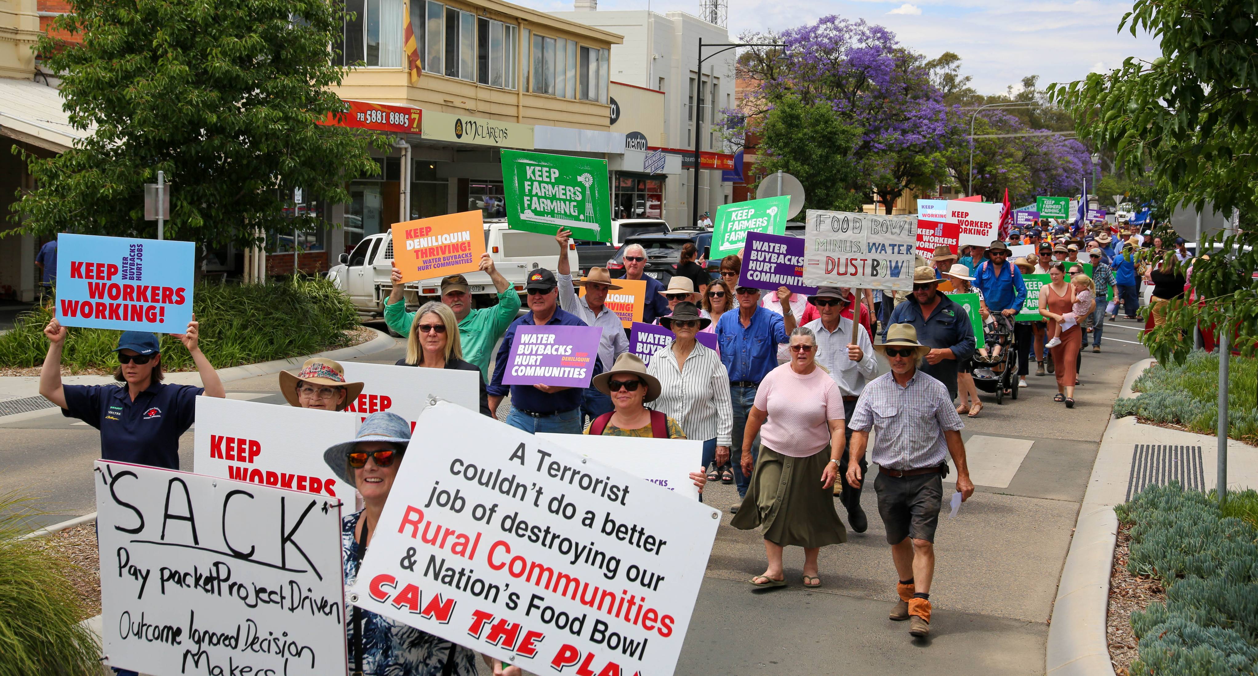 Communities march against government's water buyback plan